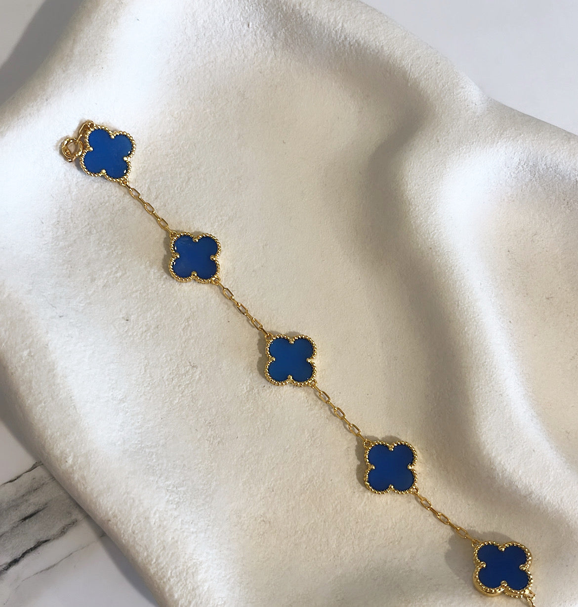 The Blue Clover Bracelet – Sarah Harrington Jewellery
